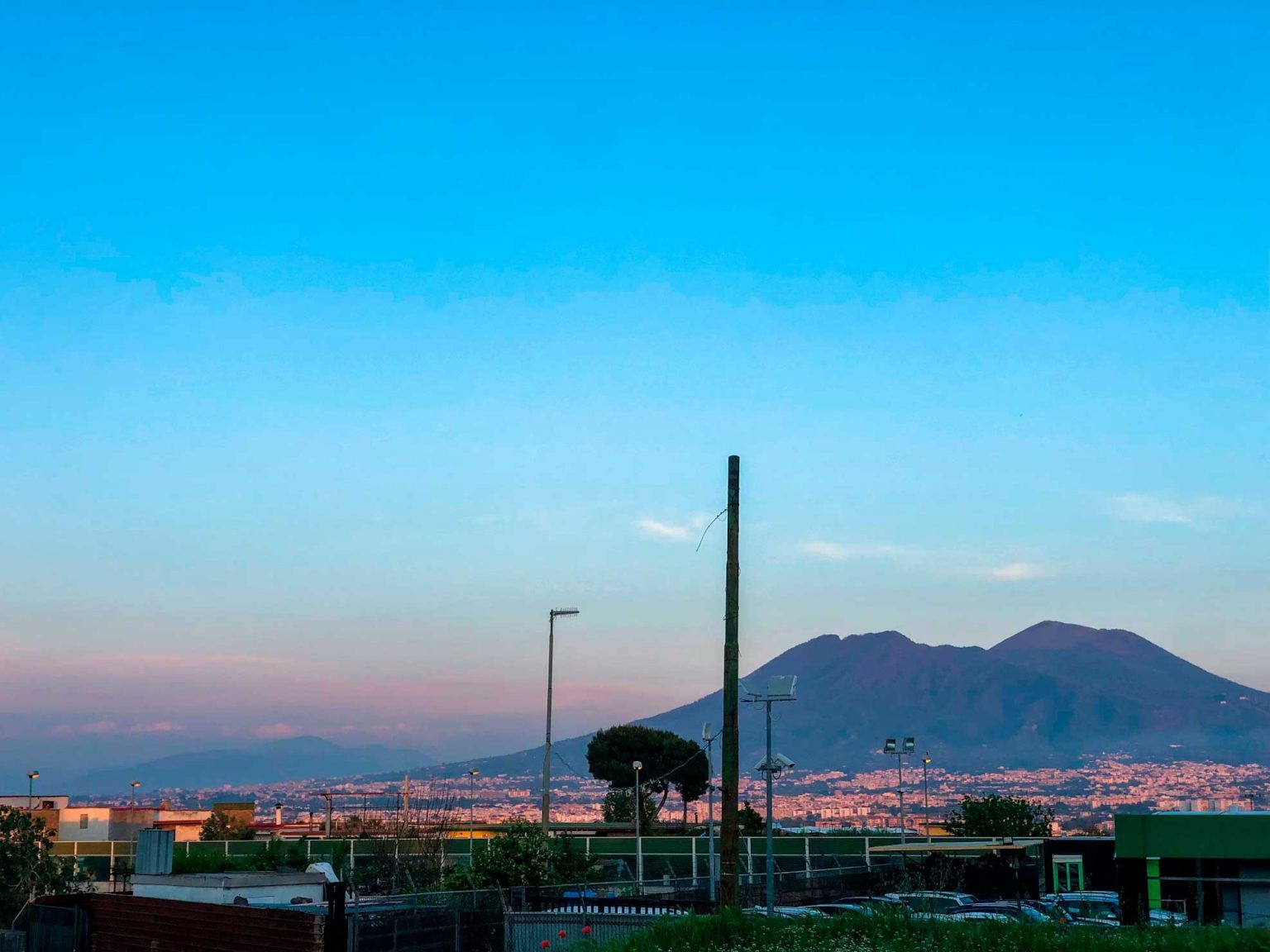 Shadows of Mount Vesuvius and the Roman Colosseum